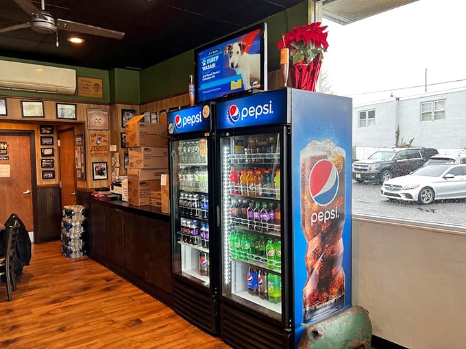 The drink selection stands ready, like loyal sidekicks to the superhero meats. Because fighting barbecue thirst requires proper hydration strategy.