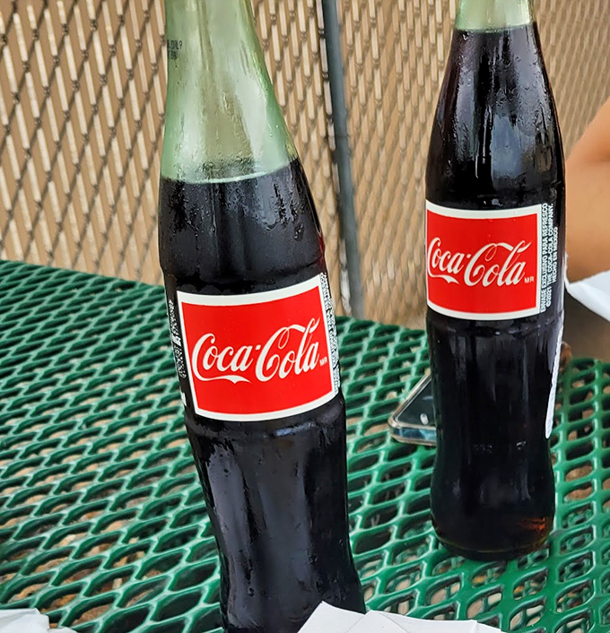 Mexican Coca-Cola in glass bottles—the perfect companion to cut through spicy chile heat. The real sugar makes all the difference.