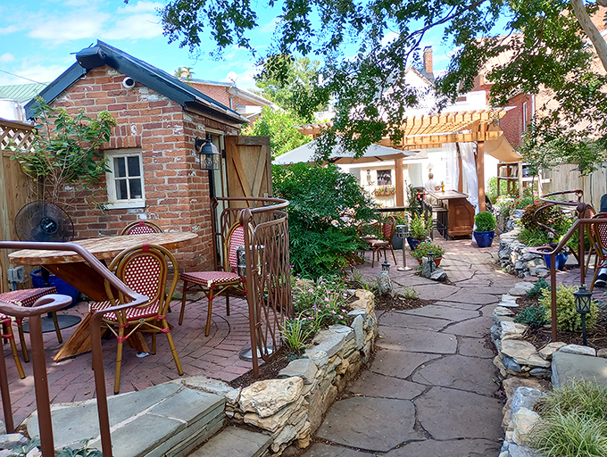 This charming courtyard at Bistro 112 whispers sweet nothings about leisurely meals and conversations that stretch into evening.