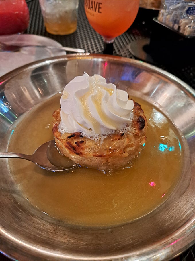 Bread pudding swimming in a warm bourbon sauce topped with whipped cream. The perfect sweet finale to a meal that takes you from Missouri to Louisiana.