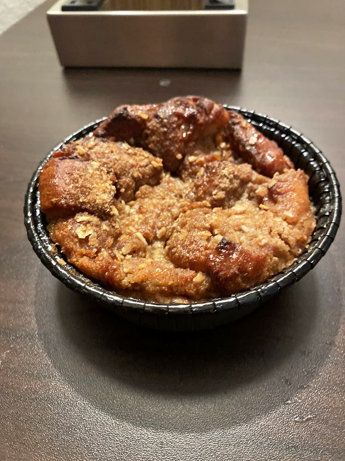 Bread pudding that makes you save room, even when there's no room left. Sweet, sticky proof that dessert is never really optional.