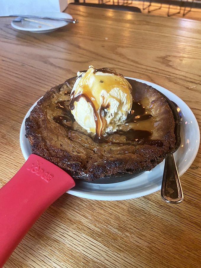 A skillet brownie topped with ice cream and caramel that doesn't just end your meal&mdash;it provides closure, therapy, and a moment of pure dessert bliss.