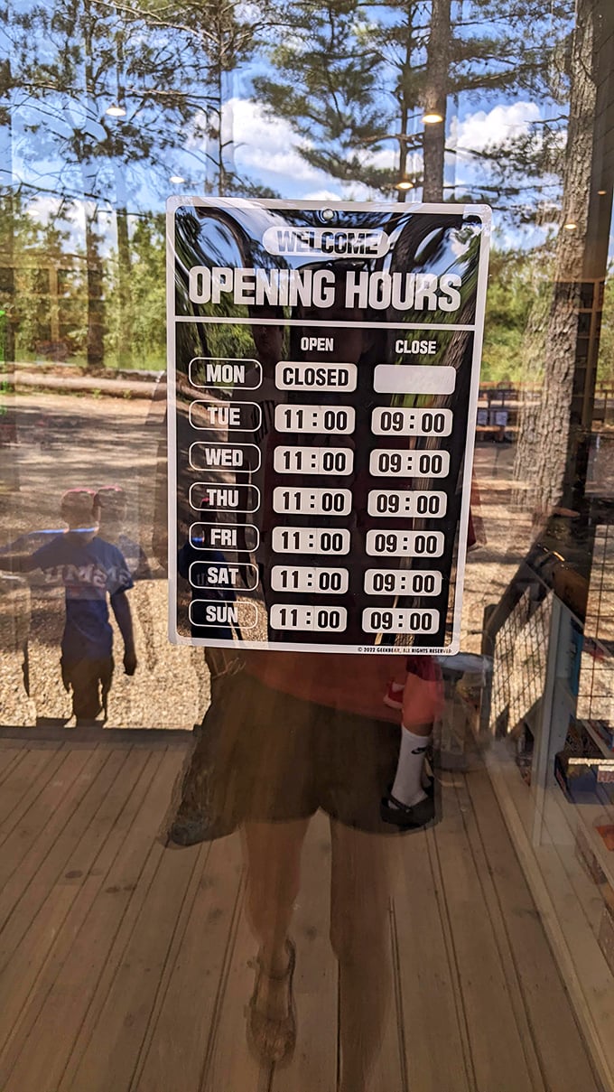 The hours of operation sign&mdash;a sacred text revealing when you can make your pilgrimage to this temple of sweetness nestled in Bigfoot country.
