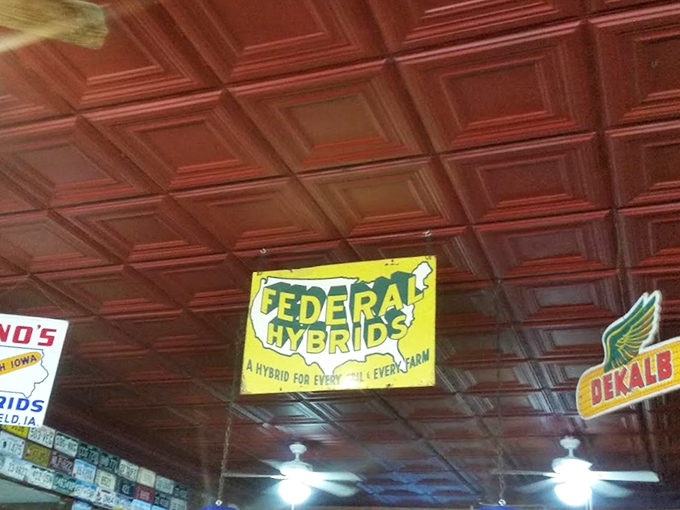 Even the ceiling tells a story at Gunder, with vintage seed company signs reminding diners of Iowa's agricultural roots.