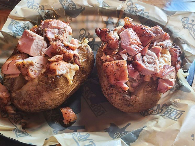 The stuffed potato&mdash;where barbecue innovation meets classic comfort. A starch vessel transformed into a delivery system for smoky chicken glory.