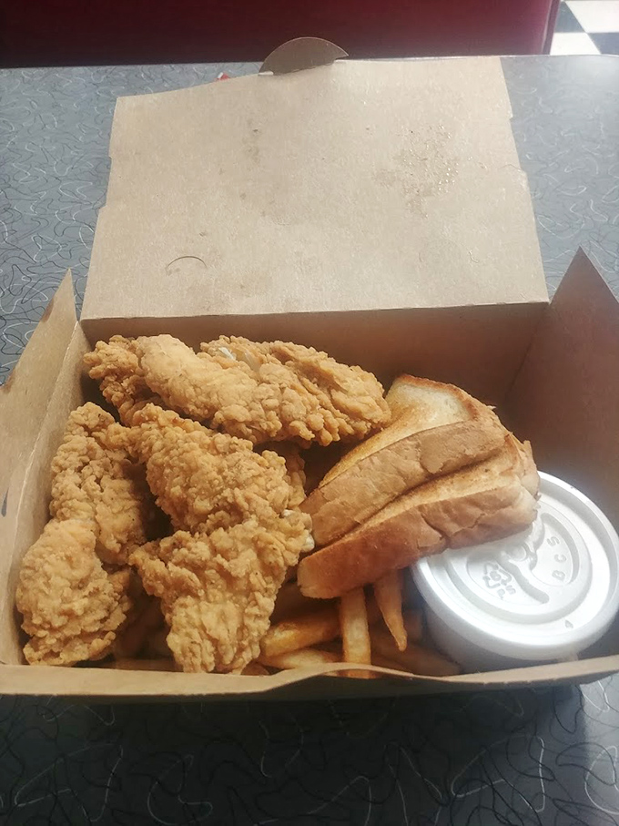 Fried chicken that makes you understand why people pull over when they see that sign&mdash;golden, crispy, and packaged for the road ahead.