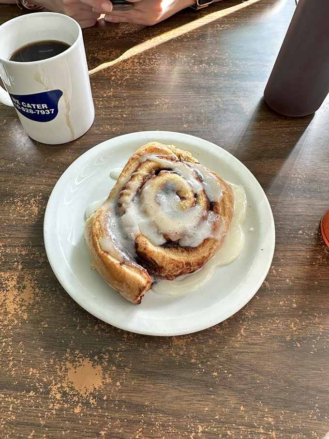 The cinnamon roll &ndash; breakfast's answer to "treat yourself" &ndash; where icing rivers flow through cinnamon valleys. Worth every sticky finger.