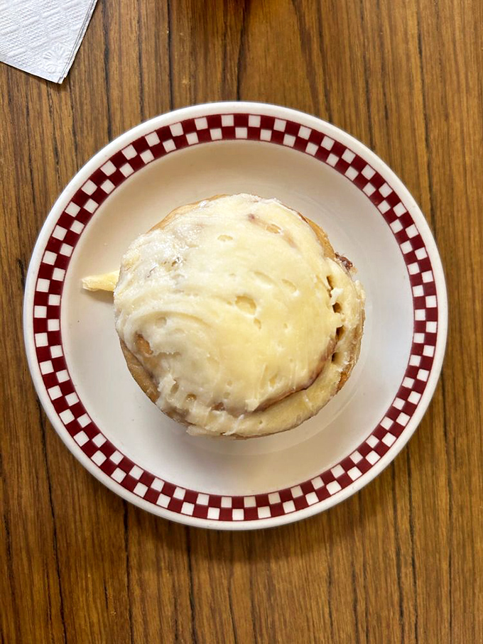 This isn't just a cinnamon roll; it's a spiral-bound promise that today is going to be better than yesterday.