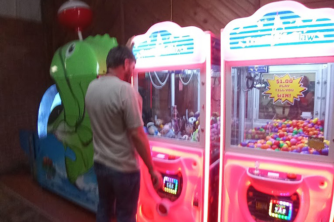 Even in the age of virtual reality, there's something eternally satisfying about the mechanical simplicity of arcade games in a bowling alley.