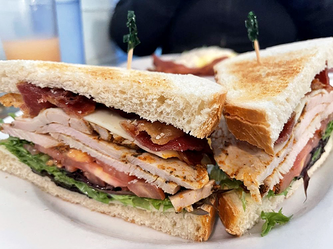 This isn't just a sandwich; it's a skyscraper of flavors where every floor offers a different delicious surprise.