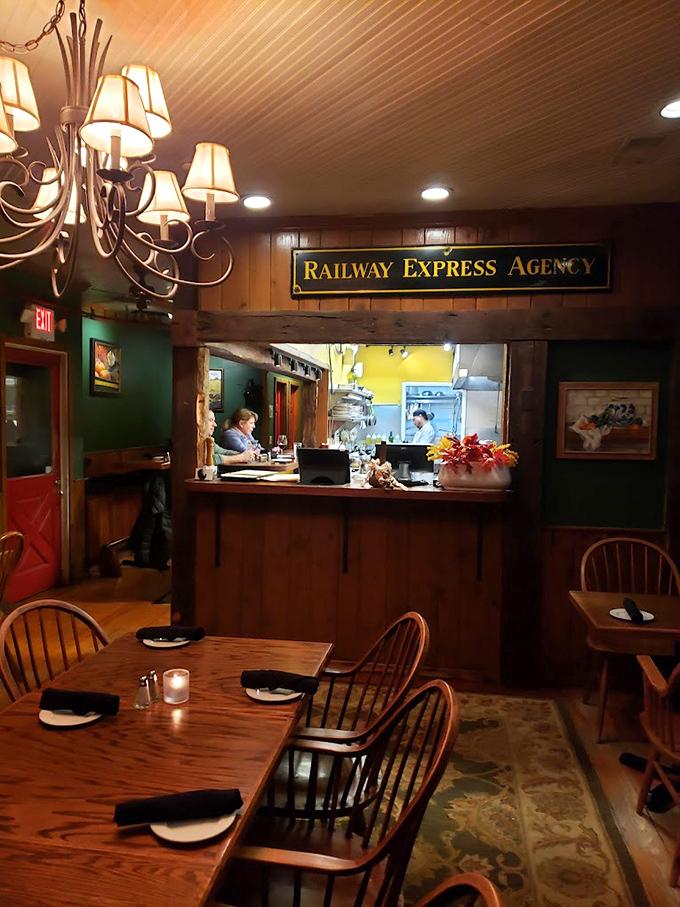 Evening transforms the dining room into a warm sanctuary where the "Railway Express Agency" sign reminds you of simpler, tastier times.