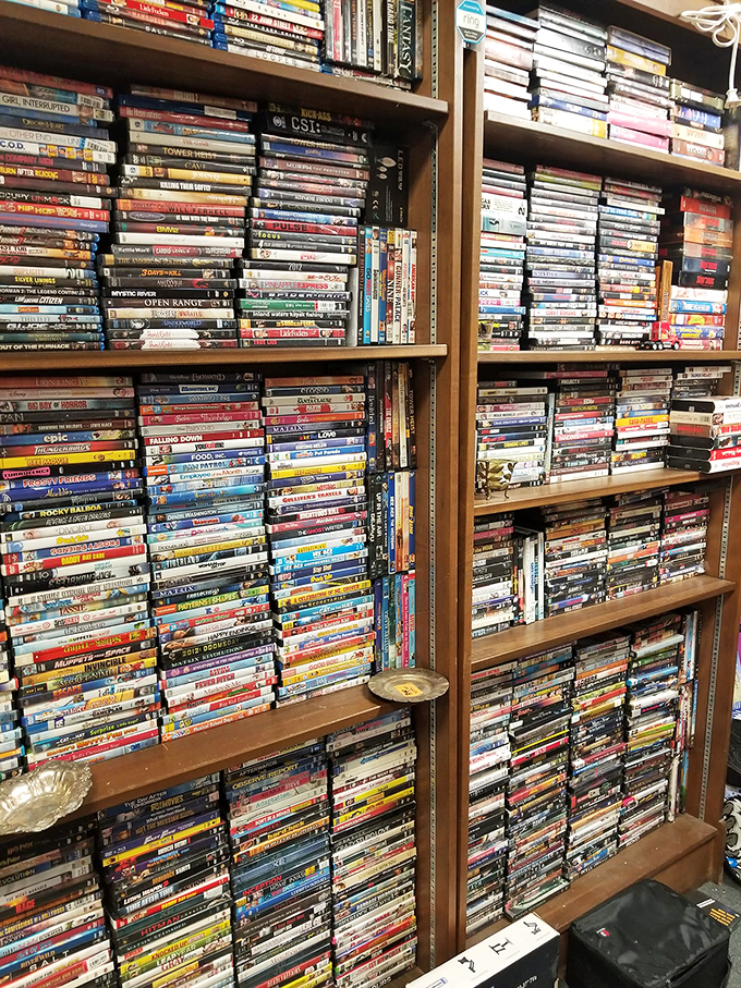 DVD shelves that could rival a small Blockbuster &ndash; proof that physical media collectors are keeping the silver disc dream alive.