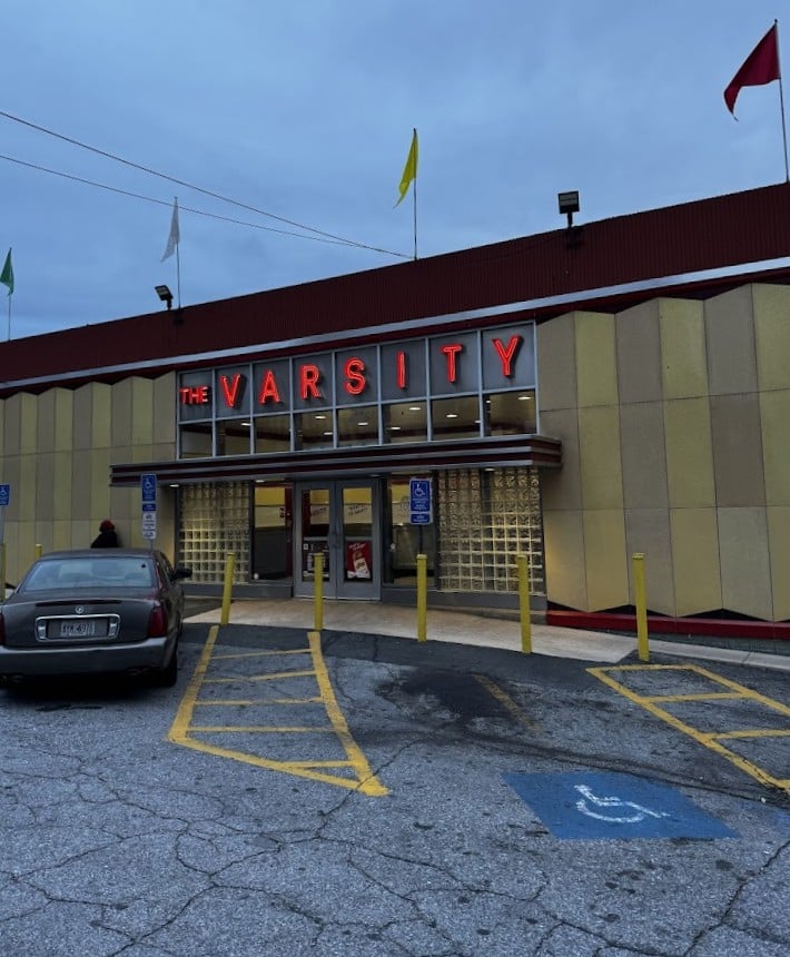 Even at dusk, The Varsity's glow is a siren call to hungry Atlantans seeking the comfort of familiar flavors in an increasingly complicated world.