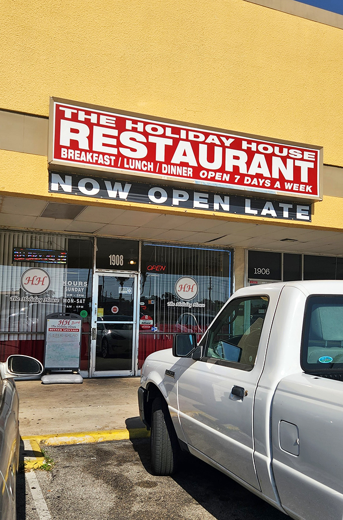 The bold red sign announces its mission without pretense: breakfast, lunch, dinner, seven days a week – the restaurant equivalent of a superhero.
