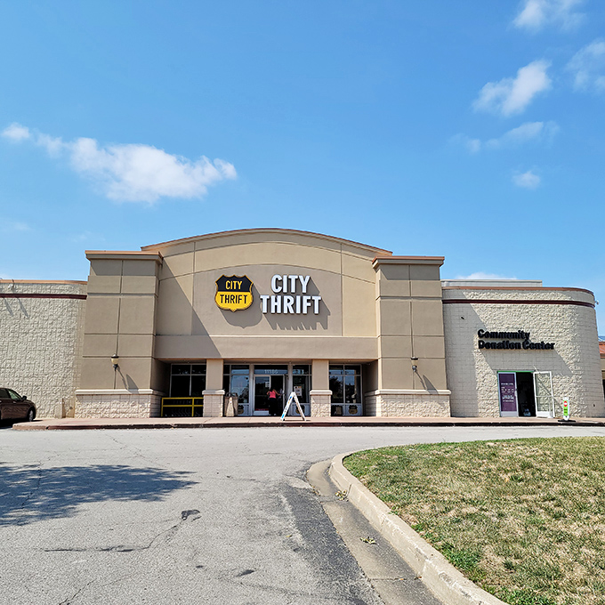 Under Kansas blue skies, City Thrift's welcoming exterior promises air-conditioned treasure hunting and the thrill of the unexpected find within.