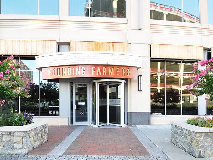 The entrance, framed by vibrant flowers, makes a promise that the food inside keeps. First impressions matter, and this one's spectacular.