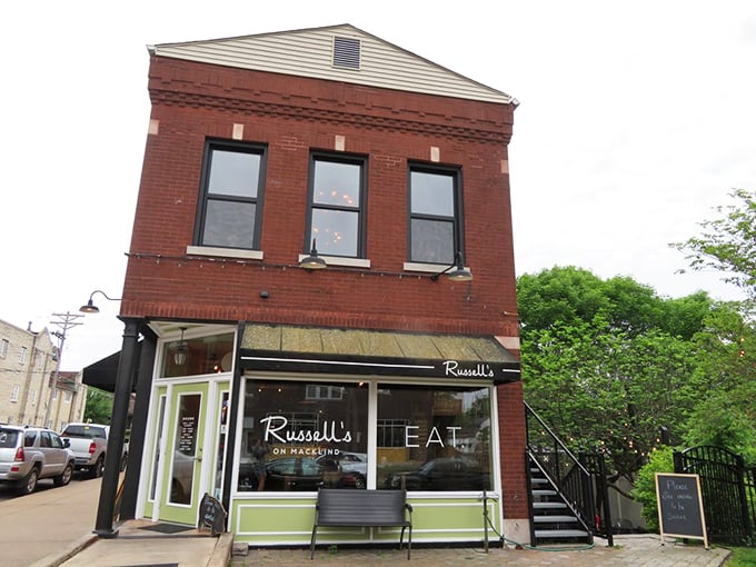 In spring and summer, Russell's brick exterior is complemented by leafy green trees&mdash;a picturesque setting for your culinary adventure.