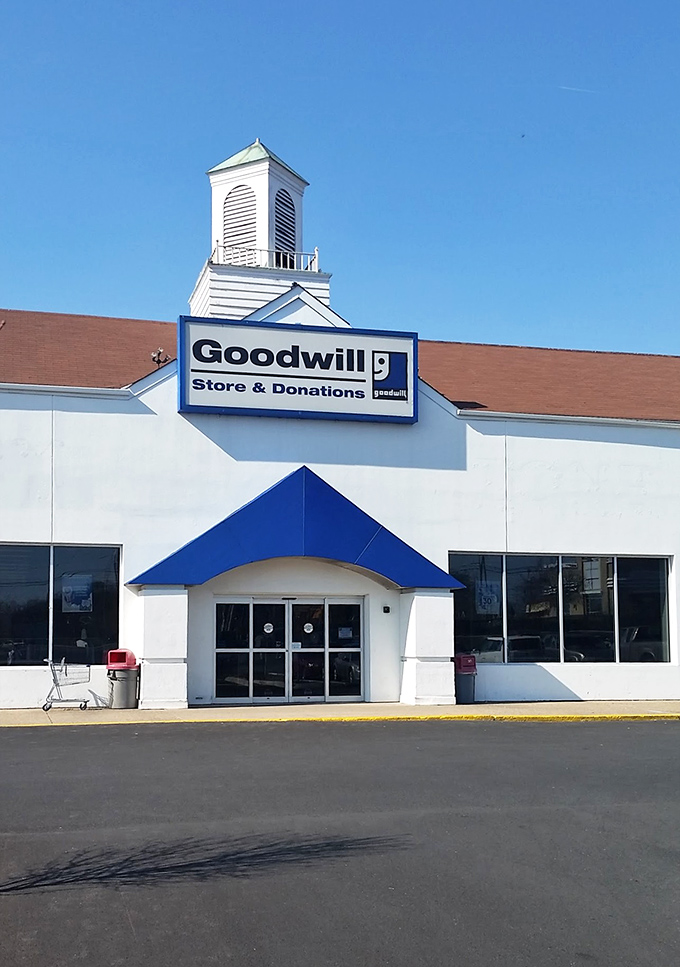 The iconic blue awning and smiling "g" logo welcome bargain hunters and eco-conscious shoppers alike. Thrift paradise awaits behind these doors.
