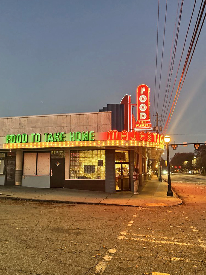 At night, the neon transforms the Majestic into a glowing beacon of hope for the hungry, the sleepless, and the "just one more slice of pie" crowd.