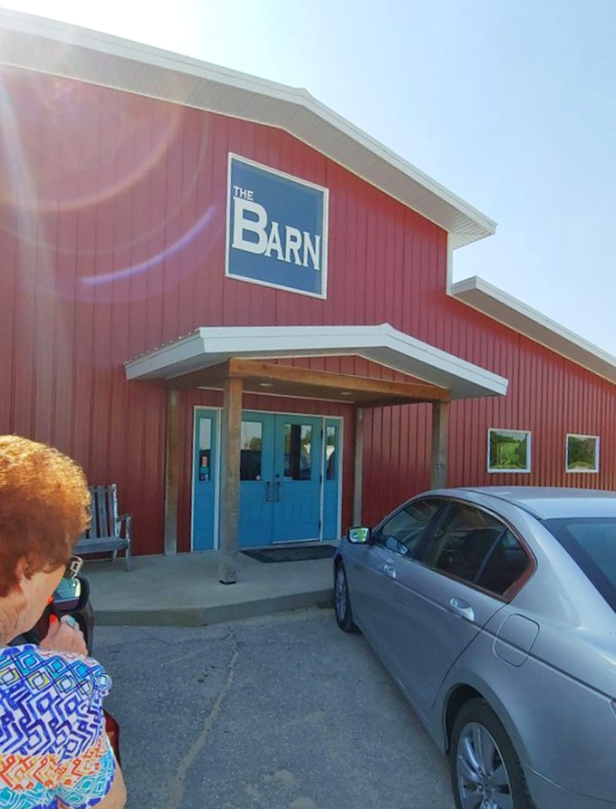 The blue doors against the red exterior create a welcoming contrast that says, "Yes, we take food seriously, but we don't take ourselves too seriously."