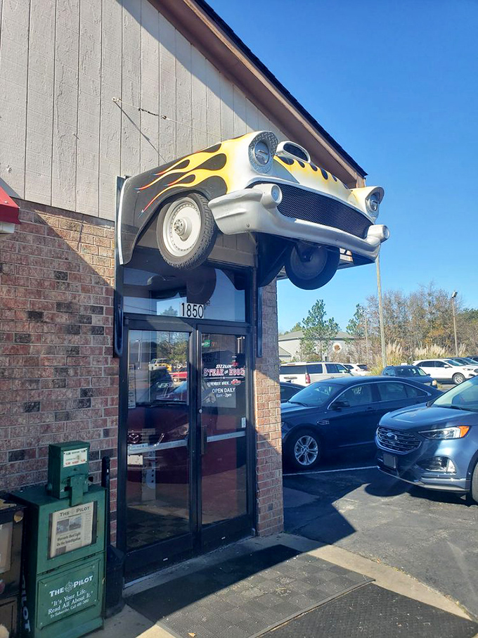 That flame-adorned vintage car isn't just decoration &ndash; it's announcing your arrival at the temple of breakfast indulgence.