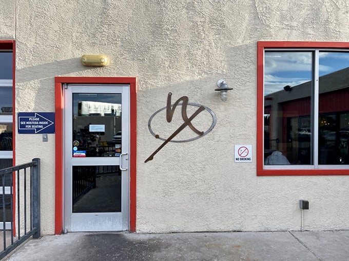 The entrance to food nirvana. That stylized "X" logo isn't just branding&mdash;it's marking the spot where culinary treasure awaits.