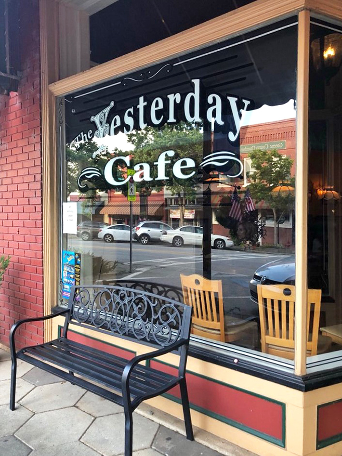 The Yesterday Cafe's storefront promises tomorrow's memories today. That bench outside? It's for the brief recovery period after pie consumption.