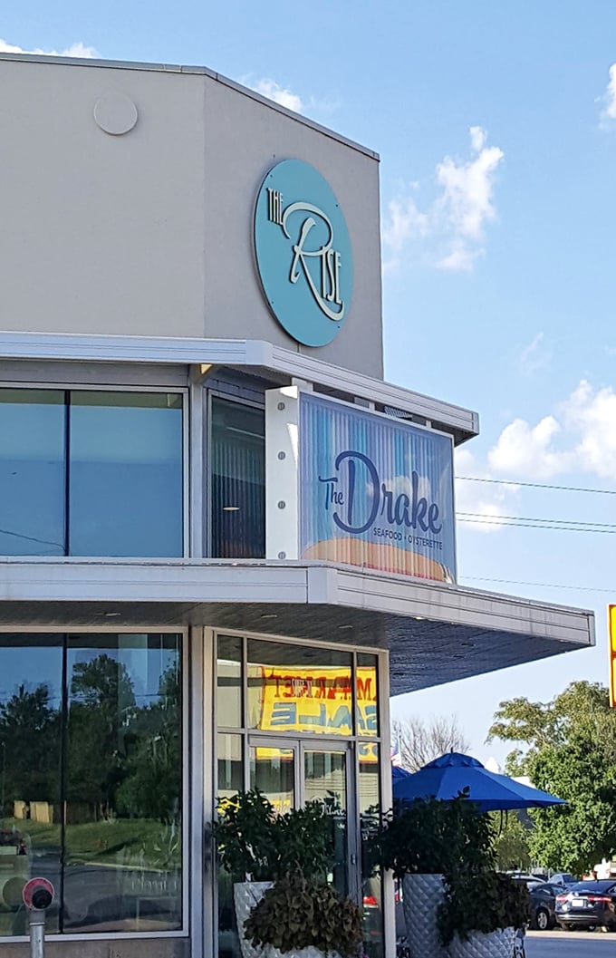 Even in daylight, The Drake's distinctive turquoise signage announces its presence with mid-century flair&mdash;a landmark for food lovers in Oklahoma City.