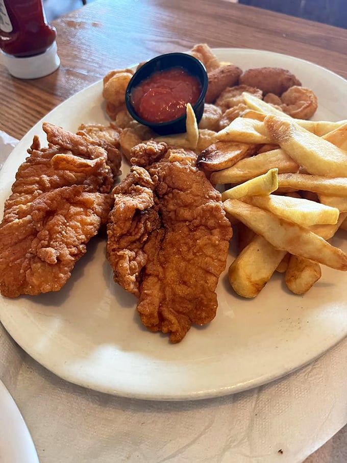 Proof that The Great 611 isn't just about beef. Golden-fried fish with crispy fries&mdash;comfort food that speaks a universal language.
