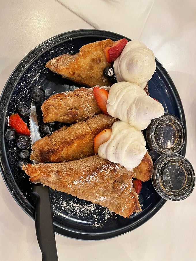 The wall of vintage photos isn't just decoration&mdash;it's a visual reminder that great food connects to something timeless and authentic.