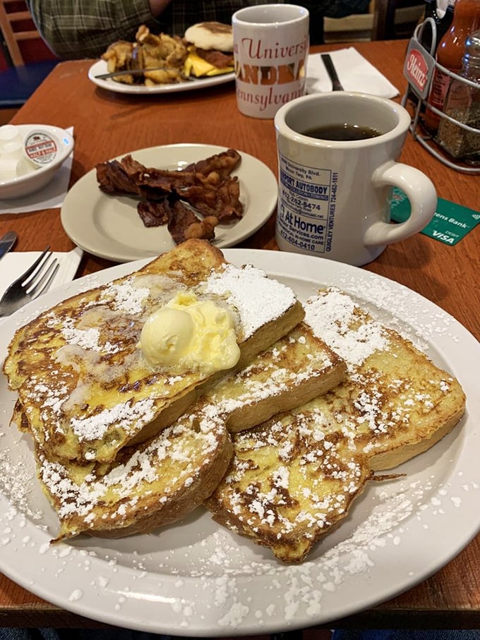 The exterior says "humble diner," but the food inside screams "breakfast royalty." Yellow never looked so appetizing.