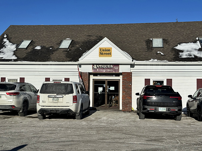 Winter can't hide the charm of Union Street Antiques, where snow-dusted rooflines frame the entrance to Rochester's most fascinating treasure hunt.