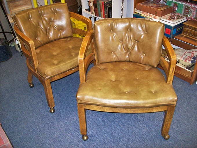 The sidewalk display functions as both invitation and preview&mdash;those metal lawn chairs have witnessed countless Nebraska summer evenings.