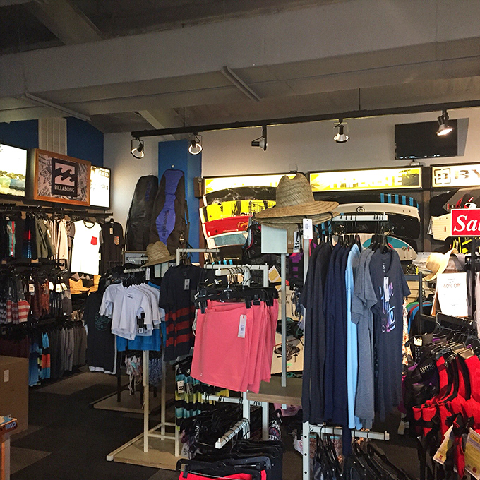 The pro shop offers everything from rash guards to boards—because nothing says "I'm committed" like owning gear for a sport you tried once.