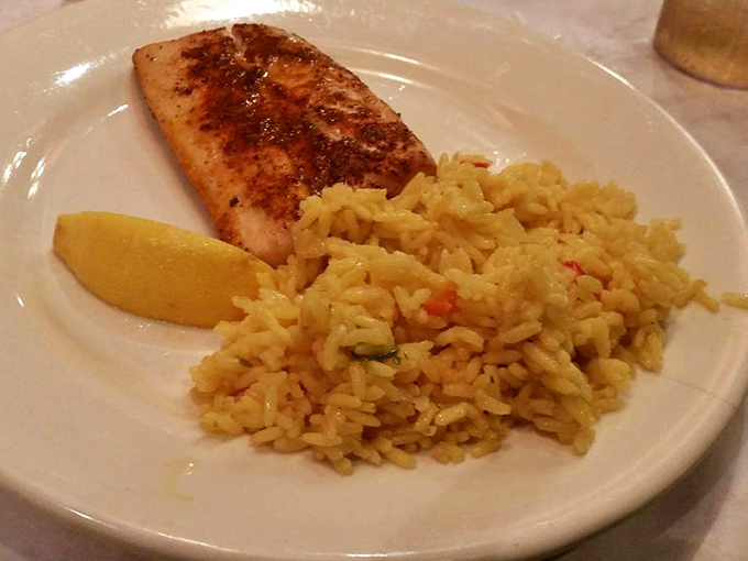 Perfectly grilled fish with a side of rice that didn't come from a box&mdash;proof that Harry's mastery extends beyond the beef department.