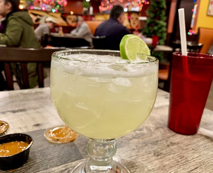 A proper margarita with salt-crusted rim and lime garnish&mdash;the liquid equivalent of a sunny afternoon with no responsibilities in sight.