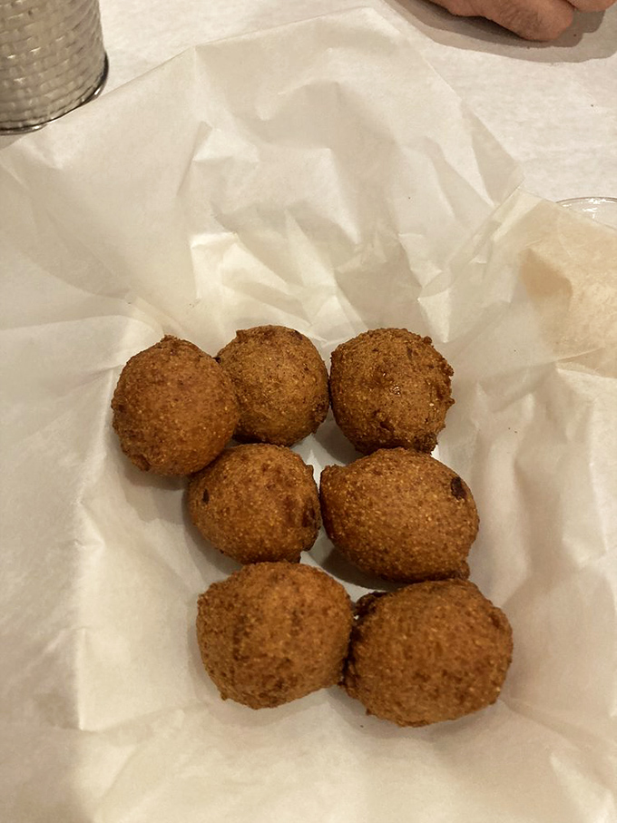 Hush puppies: golden orbs of cornmeal joy that somehow make you feel like you're at a seaside shack, not in landlocked Ohio.