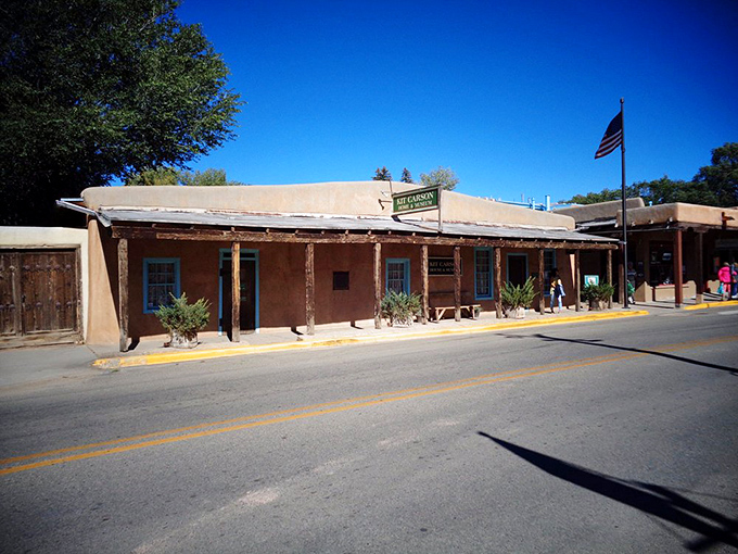 The San Francisco de Asis Church towers against the impossibly blue New Mexico sky. Its adobe curves have inspired artists for centuries, and you'll immediately understand why.