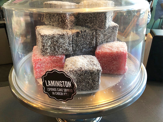 Lamingtons: Australia and New Zealand's gift to cake lovers everywhere. These chocolate-dipped, coconut-rolled squares are what snack dreams are made of.