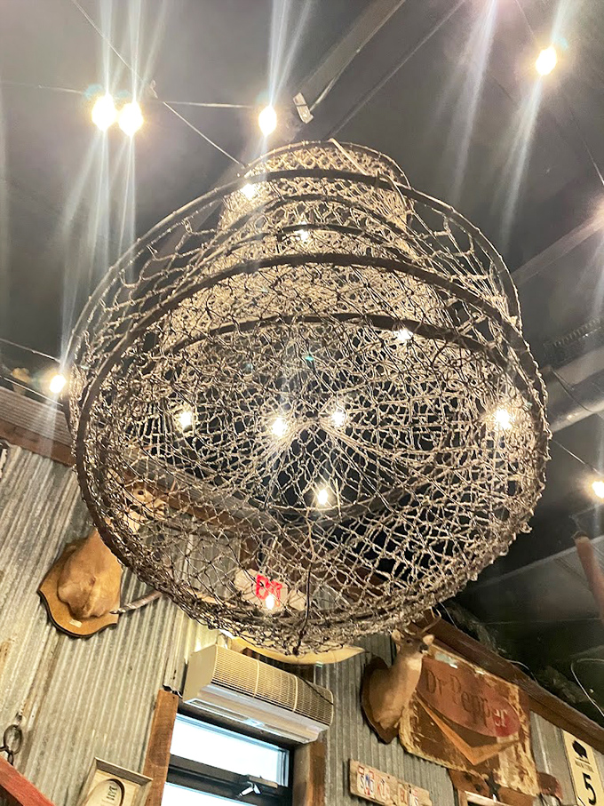 This isn't just a light fixture&mdash;it's a fishing trap repurposed to catch compliments from diners looking up between bites of smoky perfection.