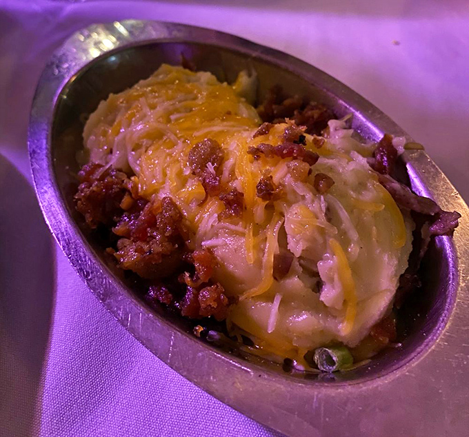 Loaded mashed potatoes that don't know the meaning of restraint &ndash; crowned with cheese, bacon bits, and pure indulgence. Diets come here to die happily.