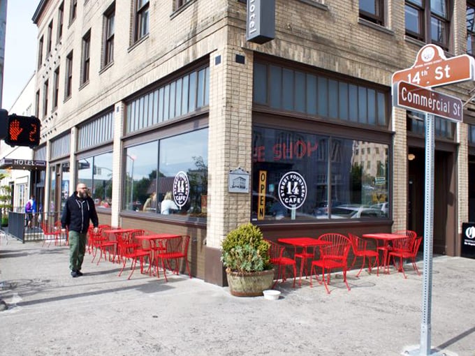 Local Diner: Street 14 Cafe anchors the corner with its bright red chairs inviting passersby to sit, sip, and watch Astoria's daily life unfold.