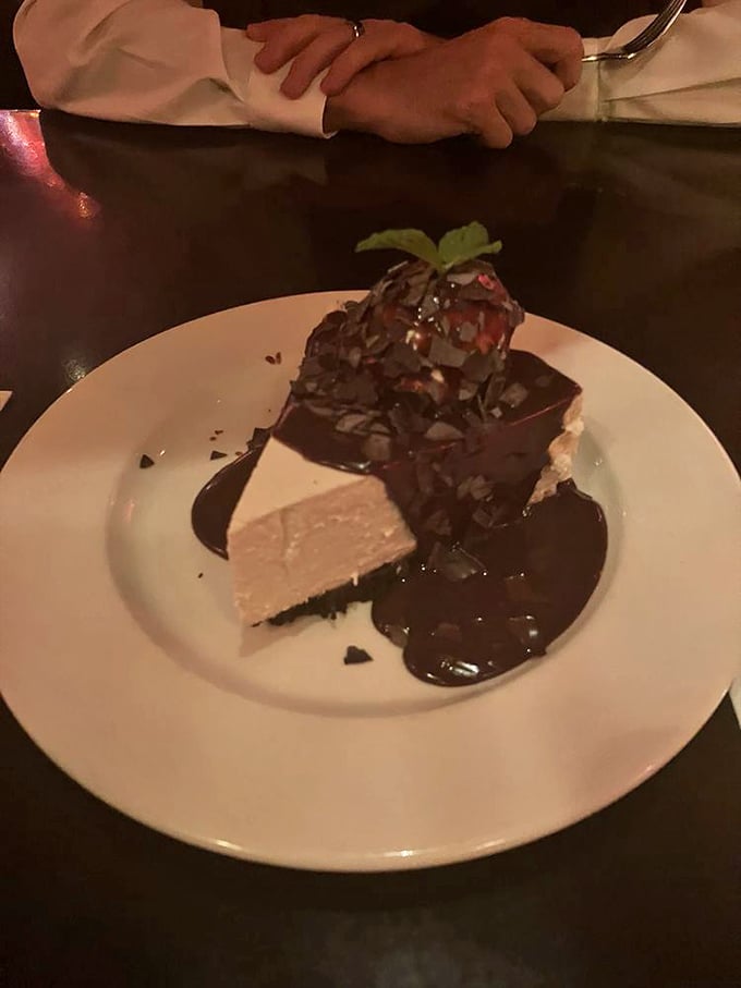 This isn't just cheesecake&mdash;it's a chocolate-draped indulgence that makes you wonder why you ever considered saving room for dessert.