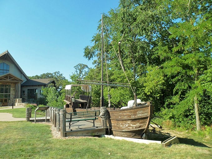 This weathered wooden boat display outside the visitor center reminds us that before highways, rivers were America's original interstate system.