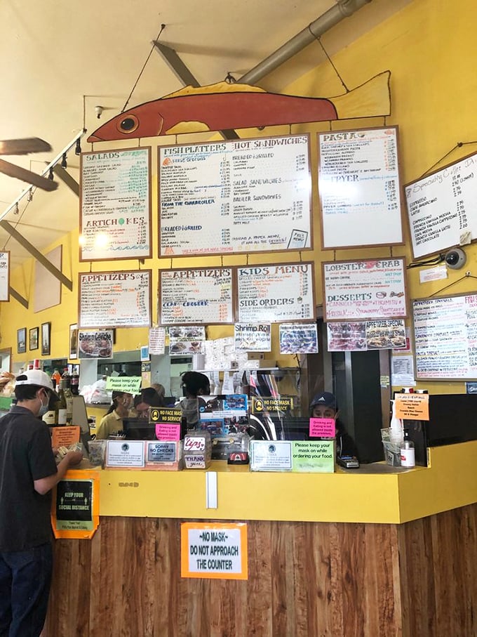 The bustling order counter, where culinary dreams begin. Choose wisely, though the secret truth is there are no wrong choices at Phil's.