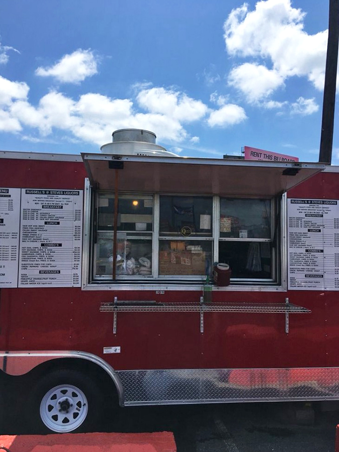 The serving window—where dreams come true and diets go to die. Worth every delicious, calorie-laden moment.