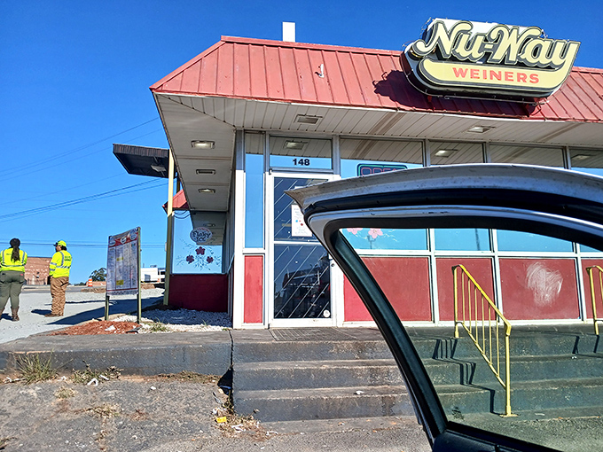 Even from the parking lot, that Nu-Way sign promises something authentic in a world of culinary pretenders. Some landmarks need no explanation.