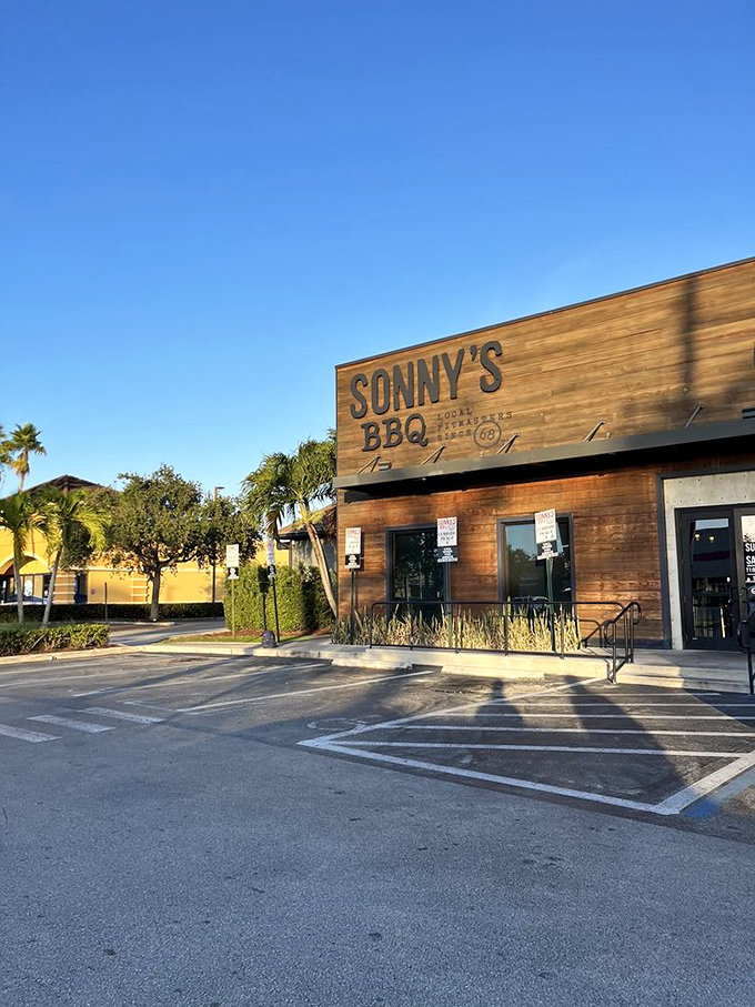 Morning light catches Sonny's wooden signage just right, promising a day where barbecue solves whatever problems you might have.