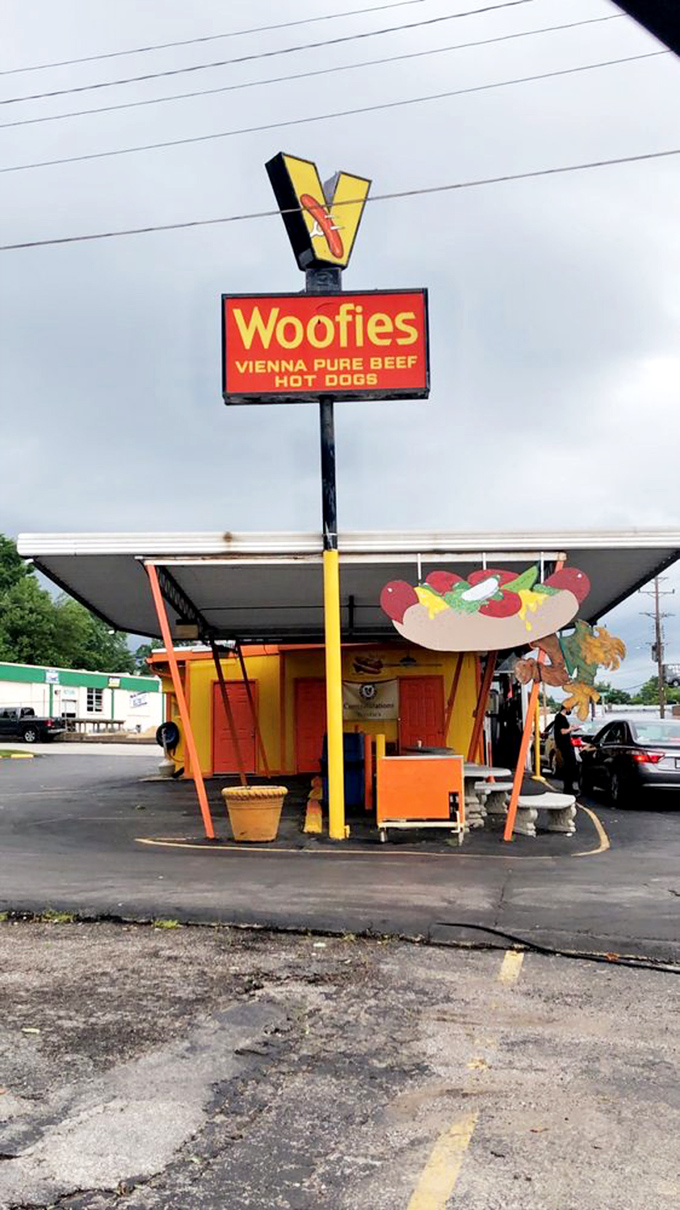 The iconic Woofie's sign stands tall against the Missouri sky. Like the North Star for hungry travelers, it guides the famished to their flavorful destination.