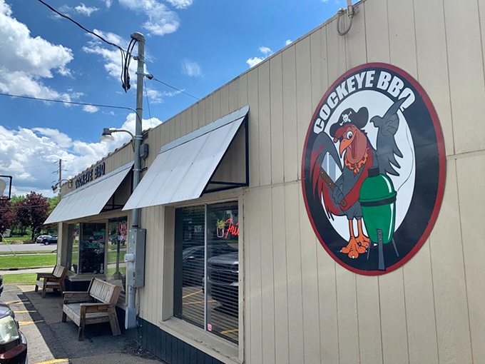 Blue skies and barbecue&mdash;Cockeye's exterior stands ready to welcome hungry travelers with its iconic rooster mascot standing guard.
